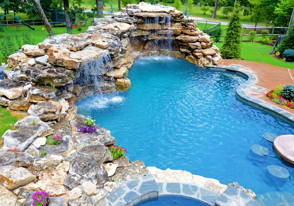 Free-form pools by Atlantis Pools & Spas Inc, Tulsa, Ok.