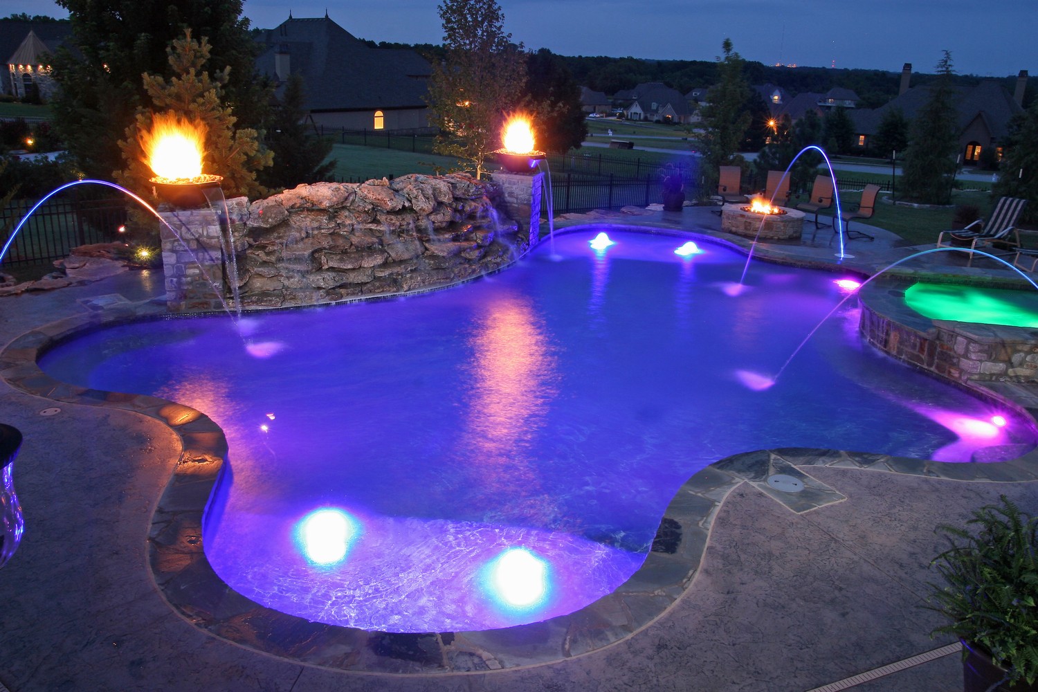 Free-form pools by Atlantis Pools & Spas Inc, Tulsa, Ok.