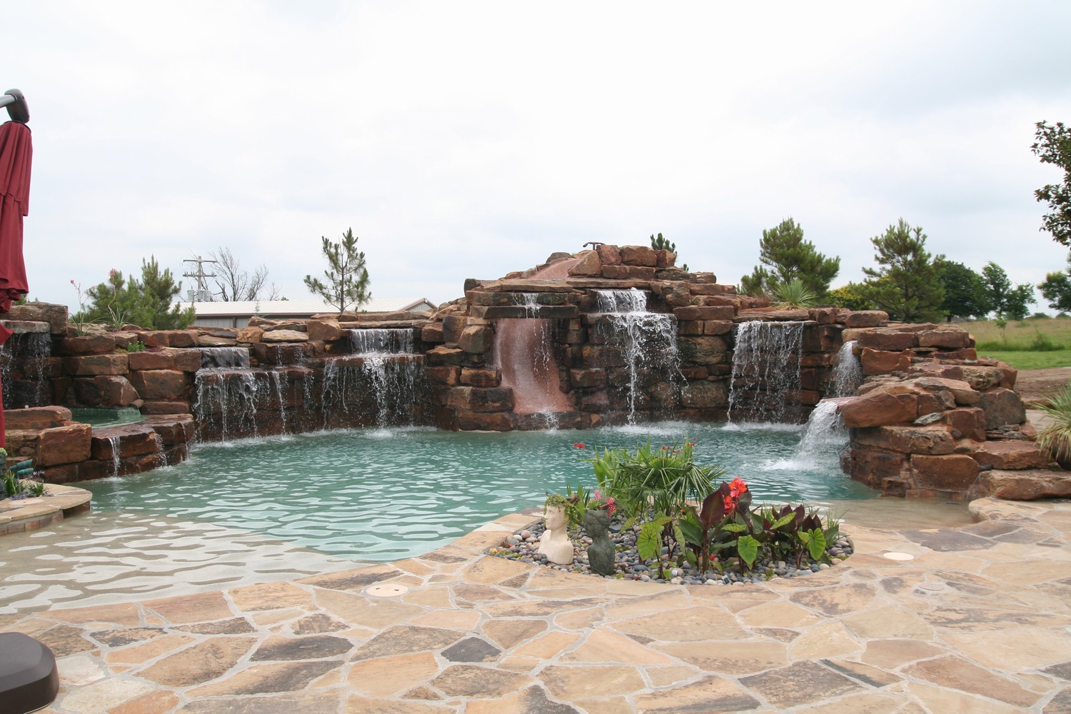 Free-form pools by Atlantis Pools & Spas Inc, Tulsa, Ok.