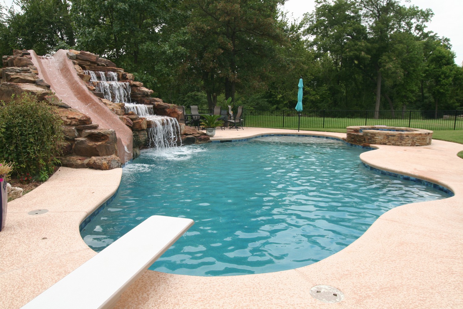Free-form pools by Atlantis Pools & Spas Inc, Tulsa, Ok.