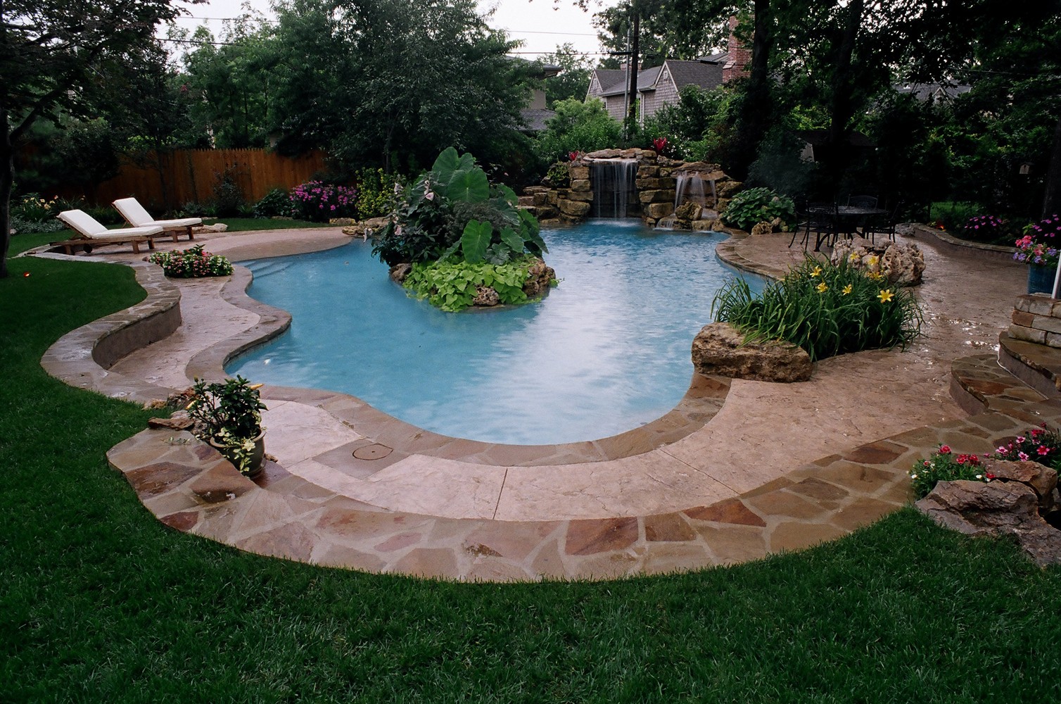 Free-form pools by Atlantis Pools & Spas Inc, Tulsa, Ok.